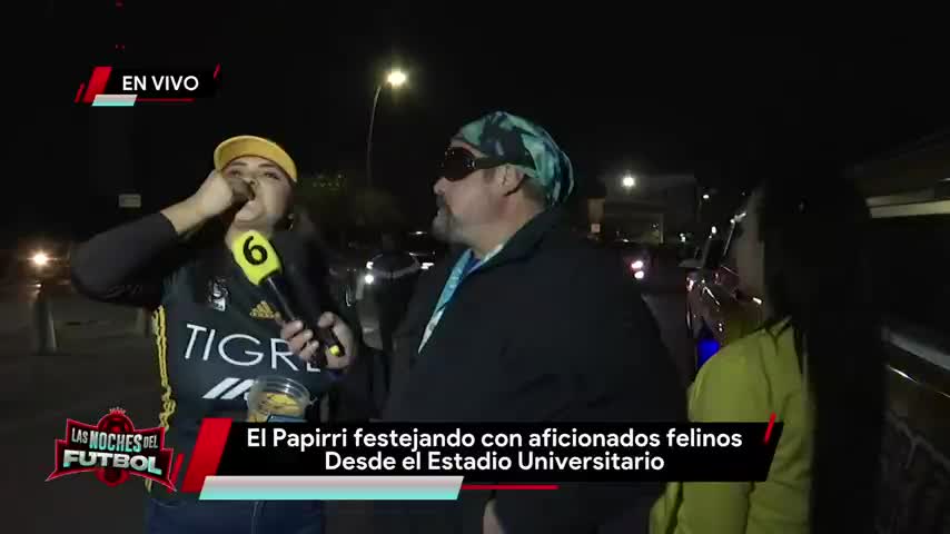 El Papirri festejando el triunfo con aficionados felinos